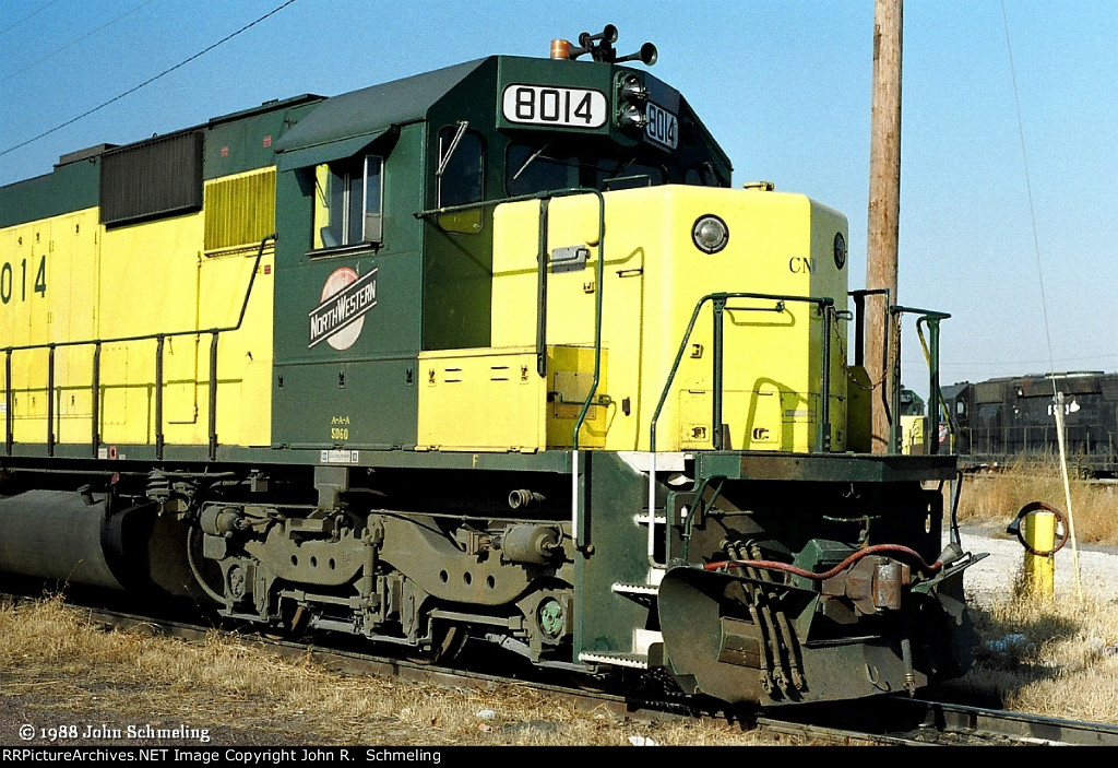 CNW 8014 (SD60) Cab and Front Pilot details at Boone Iowa. 10/17/1988 (Photo date approximate)